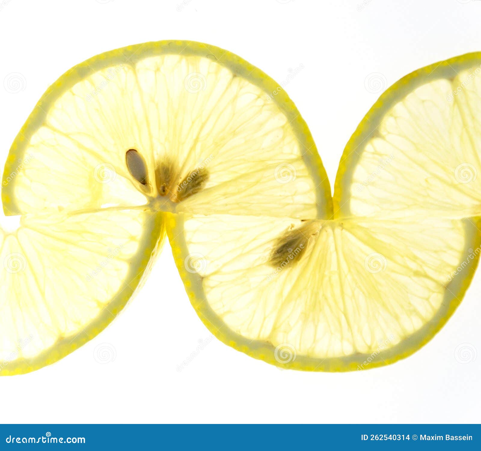 Thin Lemon Slices are Folded in a Pattern on a White Background Stock ...