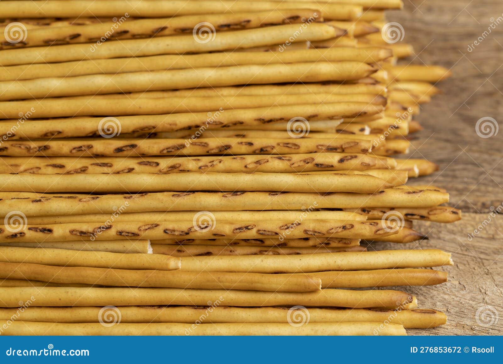 Thin and Long Bread Sticks Made of Wheat Flour on the Table Stock Photo ...