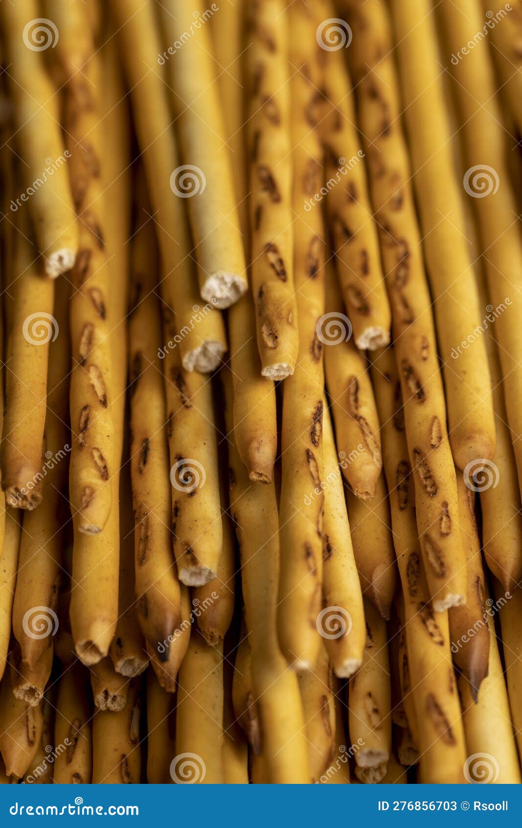 Thin and Long Bread Sticks Made of Wheat Flour on the Table Stock Image ...
