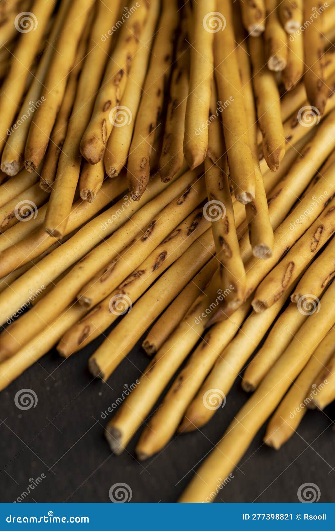 Thin and Long Bread Sticks Made of Wheat Flour on the Table Stock Image ...