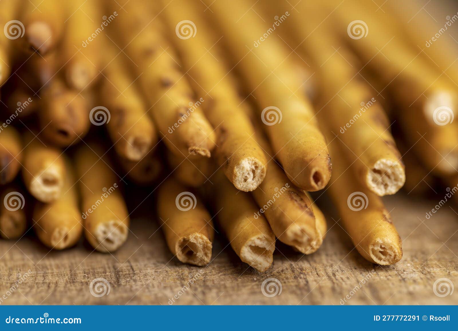 Thin and Long Bread Sticks Made of Wheat Flour on the Table Stock Image ...