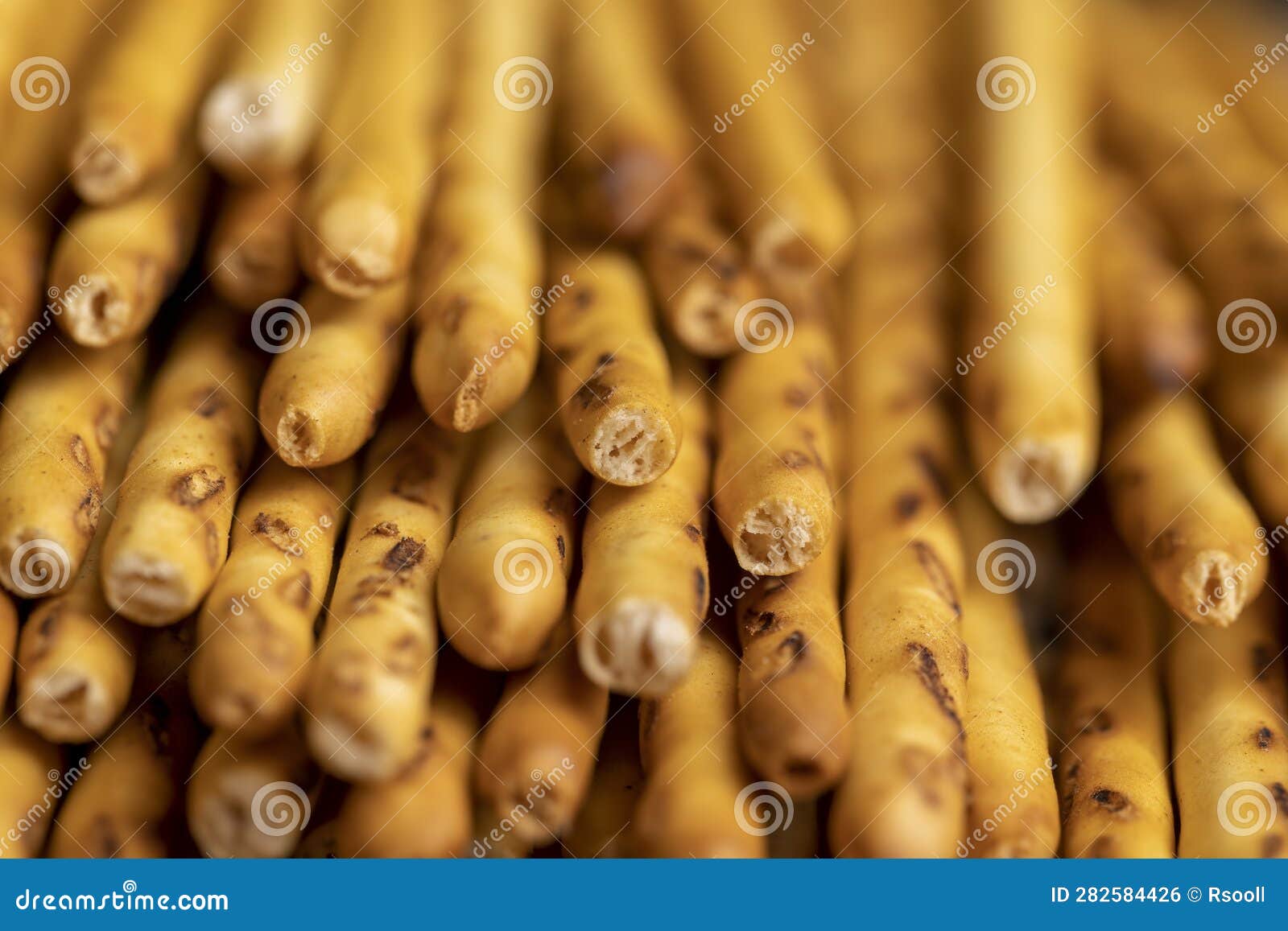 Thin and Long Bread Sticks Made of Wheat Flour on the Table Stock Photo ...