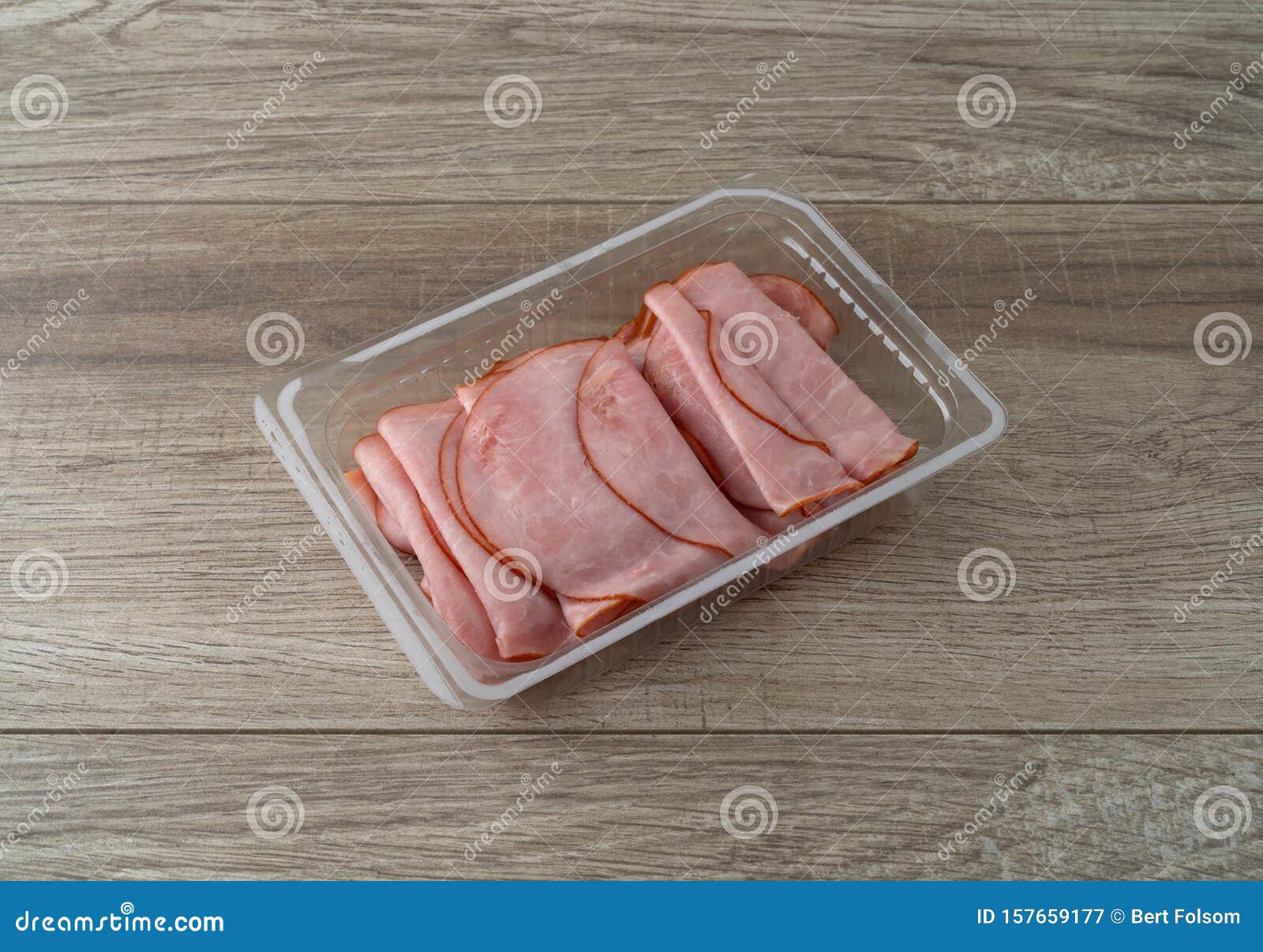 Thin Sliced Ham in a Plastic Tray on a Table Top Stock Image - Image of ...