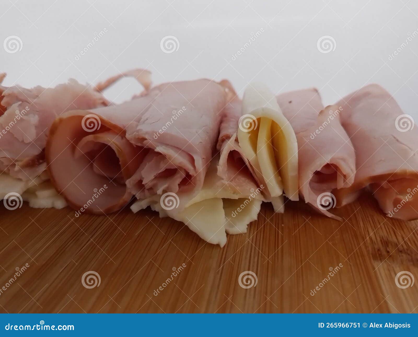 Thin Sliced Ham and Swiss Cheese on a Cutting Table Stock Image - Image ...