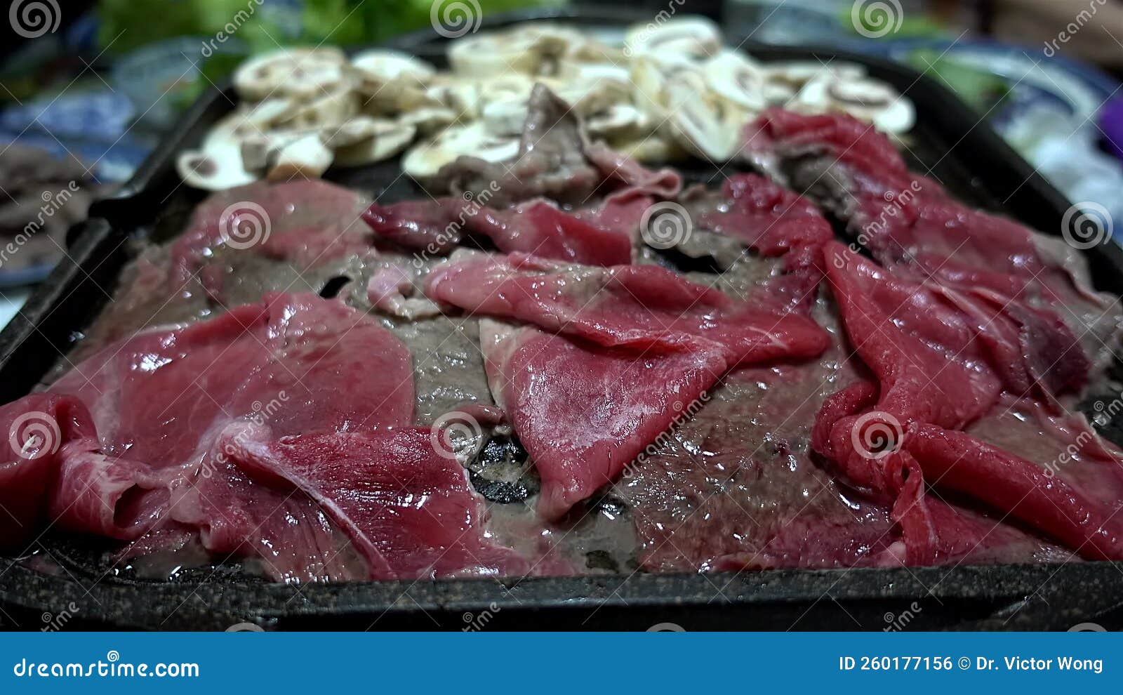 Thin Slices of Fresh Lean Beef Sizzling on a Griddle Stock Footage ...