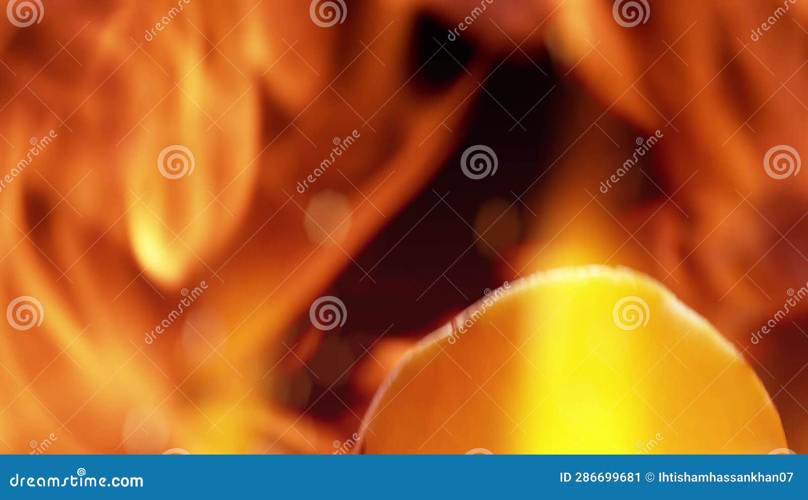 Thin Slices of Potato Falling among Burning Fire Flames in Slow Motion ...