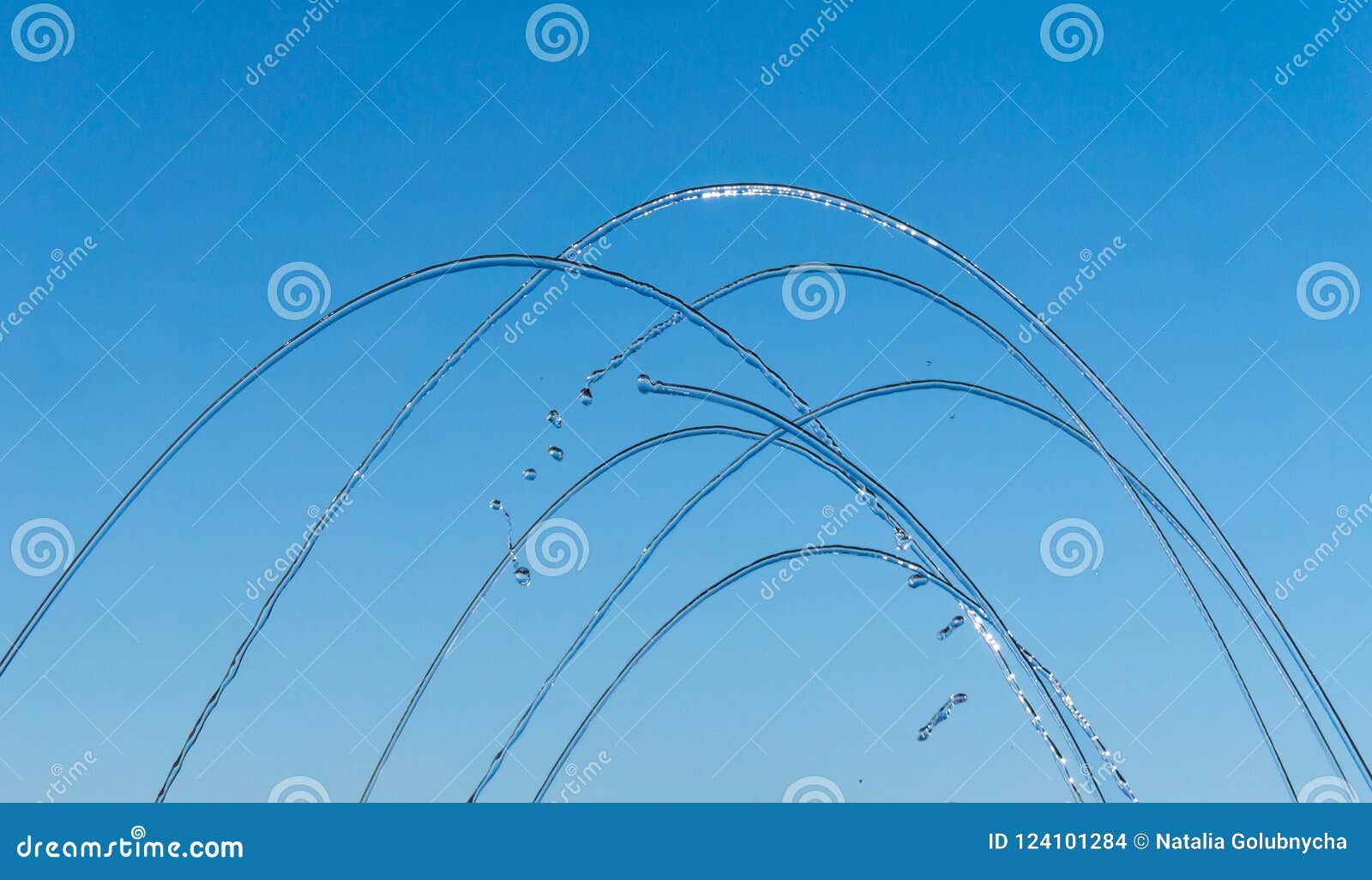 Streams and Drops of Water on a Blue Background Stock Photo - Image of ...