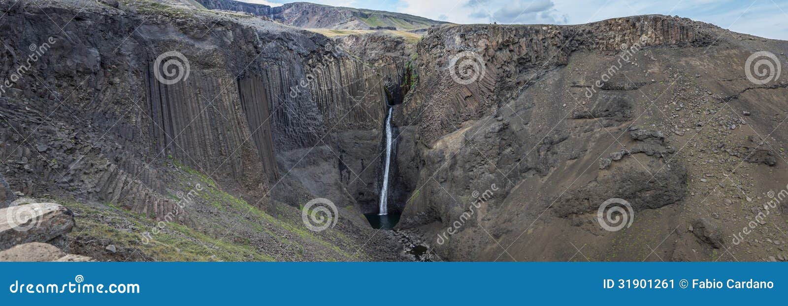 Tall Waterfall At Romsdalen Valley With Rocks And Green Forest. Blue ...