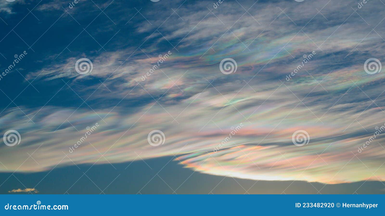 Thin Wispy Clouds Creating Rainbow Patterns of Scattered Sunlight ...