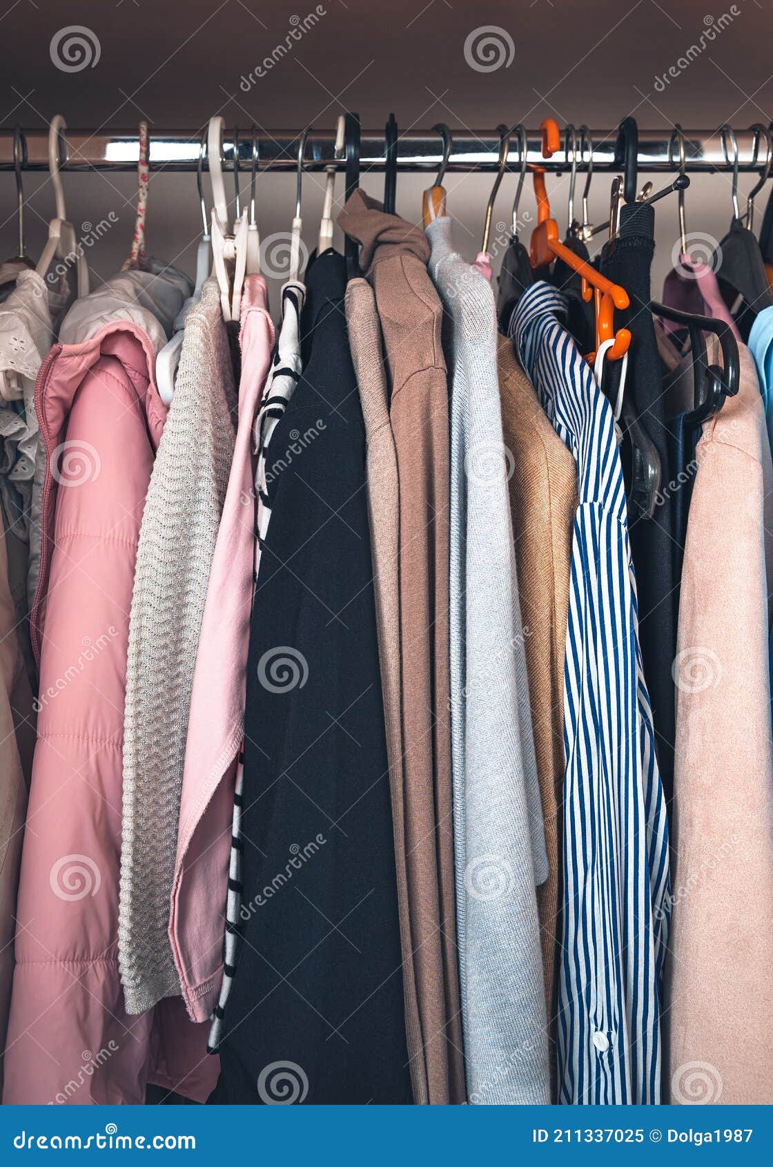 Things on Hangers Hang in a Row. Storage of Things Stock Image - Image ...