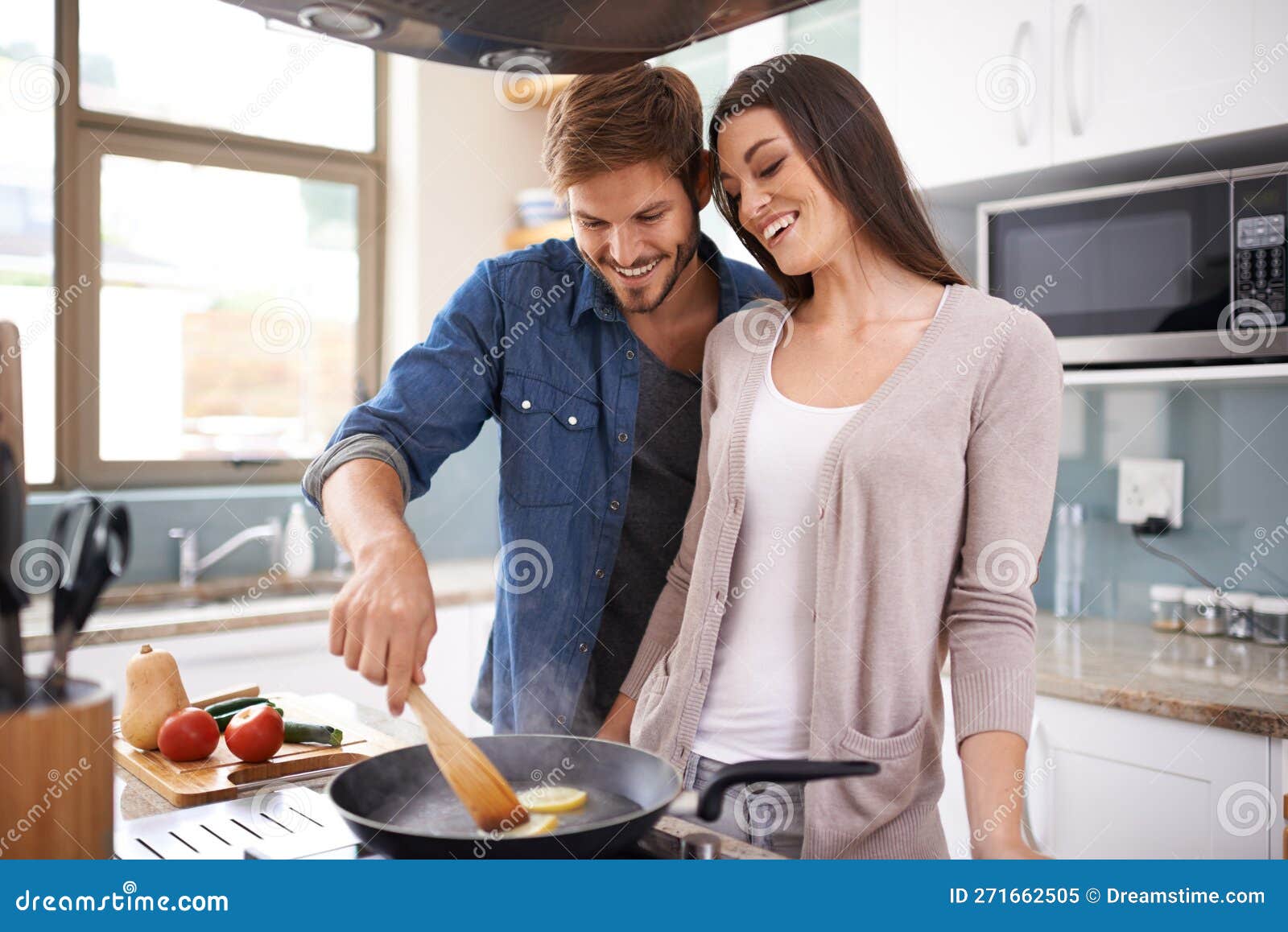 Things are Heating Up in the Kitchen. a Young Couple Making Dinner ...