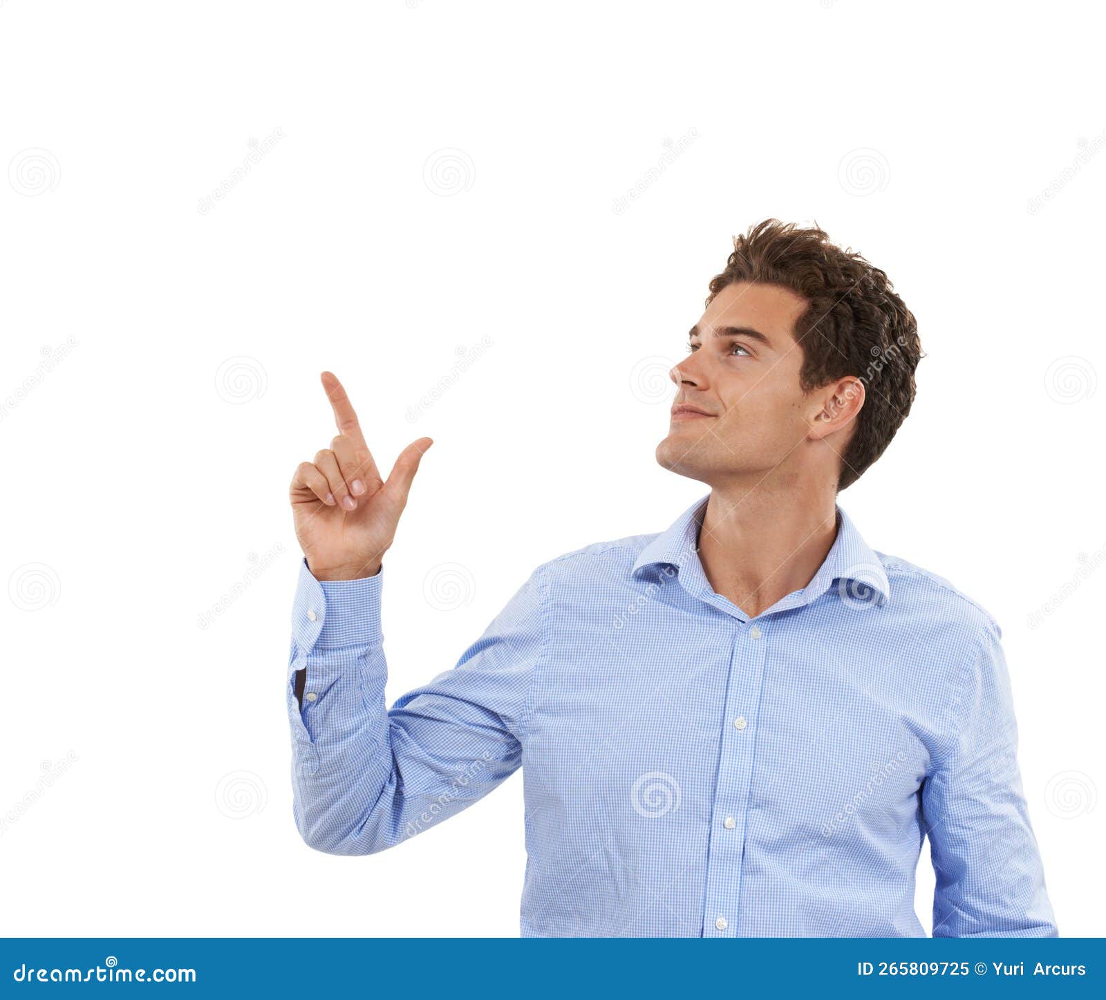 Things are Looking Up. a Handsome Young Man in a Studio Pointing Up ...