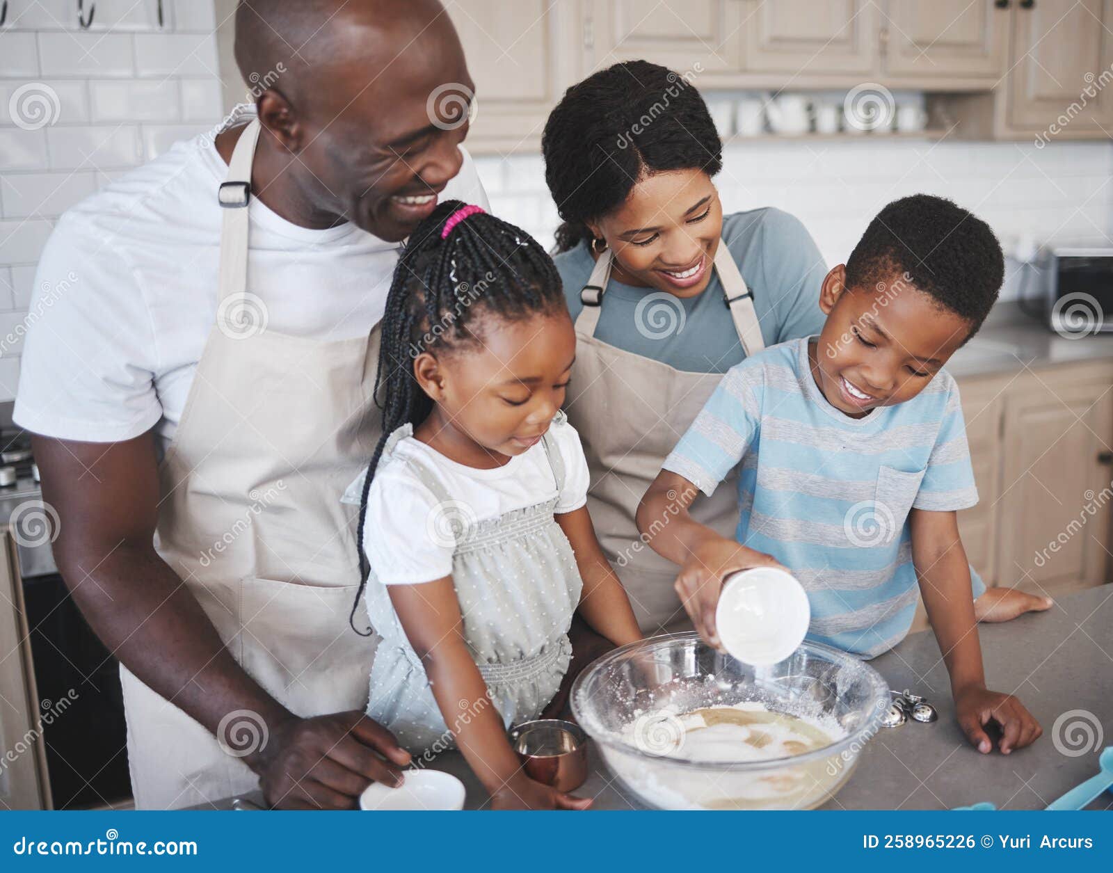 The Things that Matter are Faith, Family. a Family Baking Together in ...