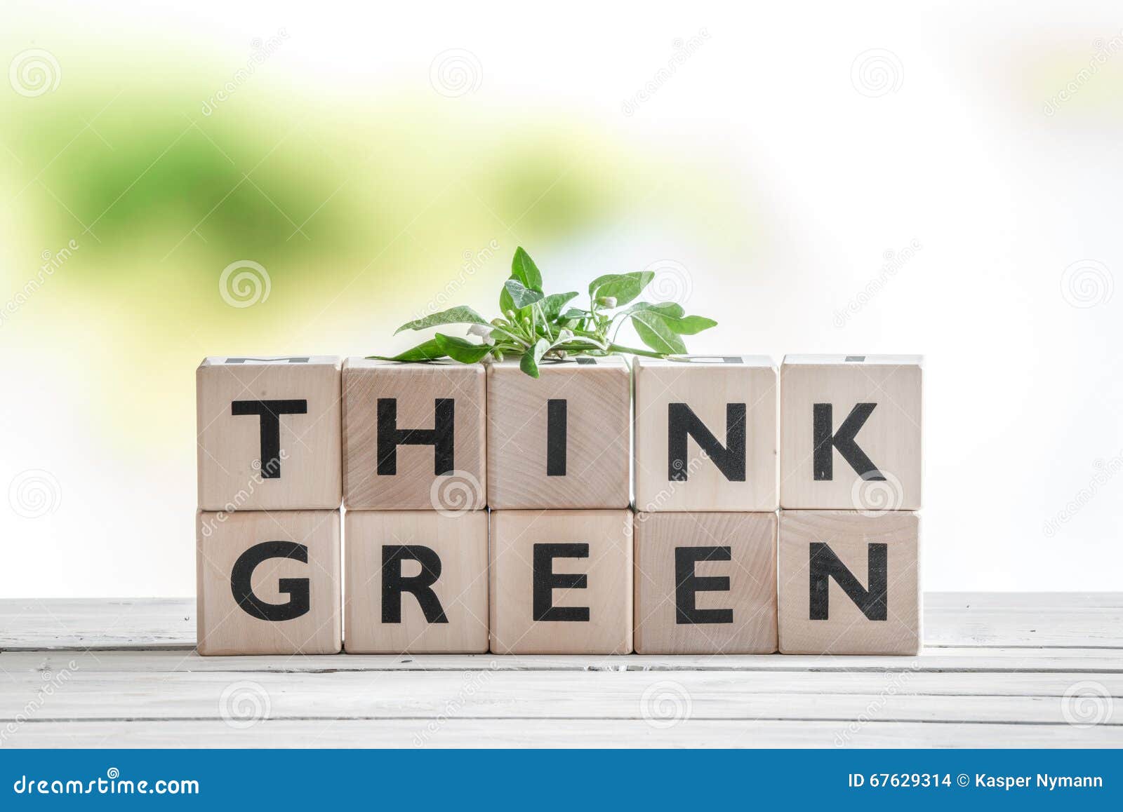 Think Green Sign with a Plant Stock Photo - Image of global, conceptual ...