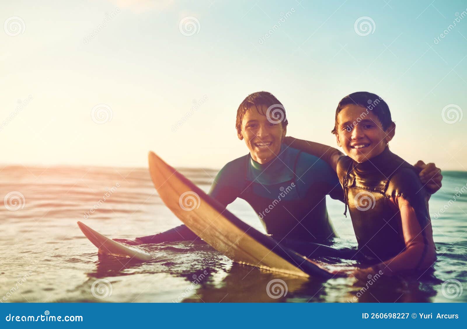 We Think that Surfing is the Coolest Thing To Do. Two Young Boys Out ...