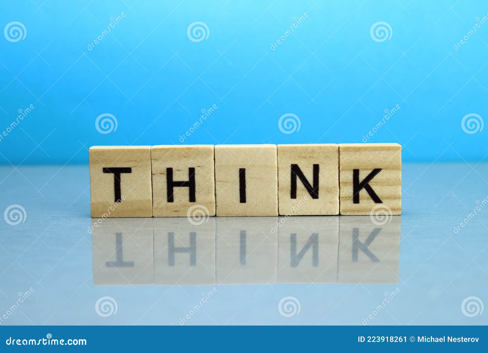 Think Word Made of Wooden Blocks on a Blue Background Stock Image ...