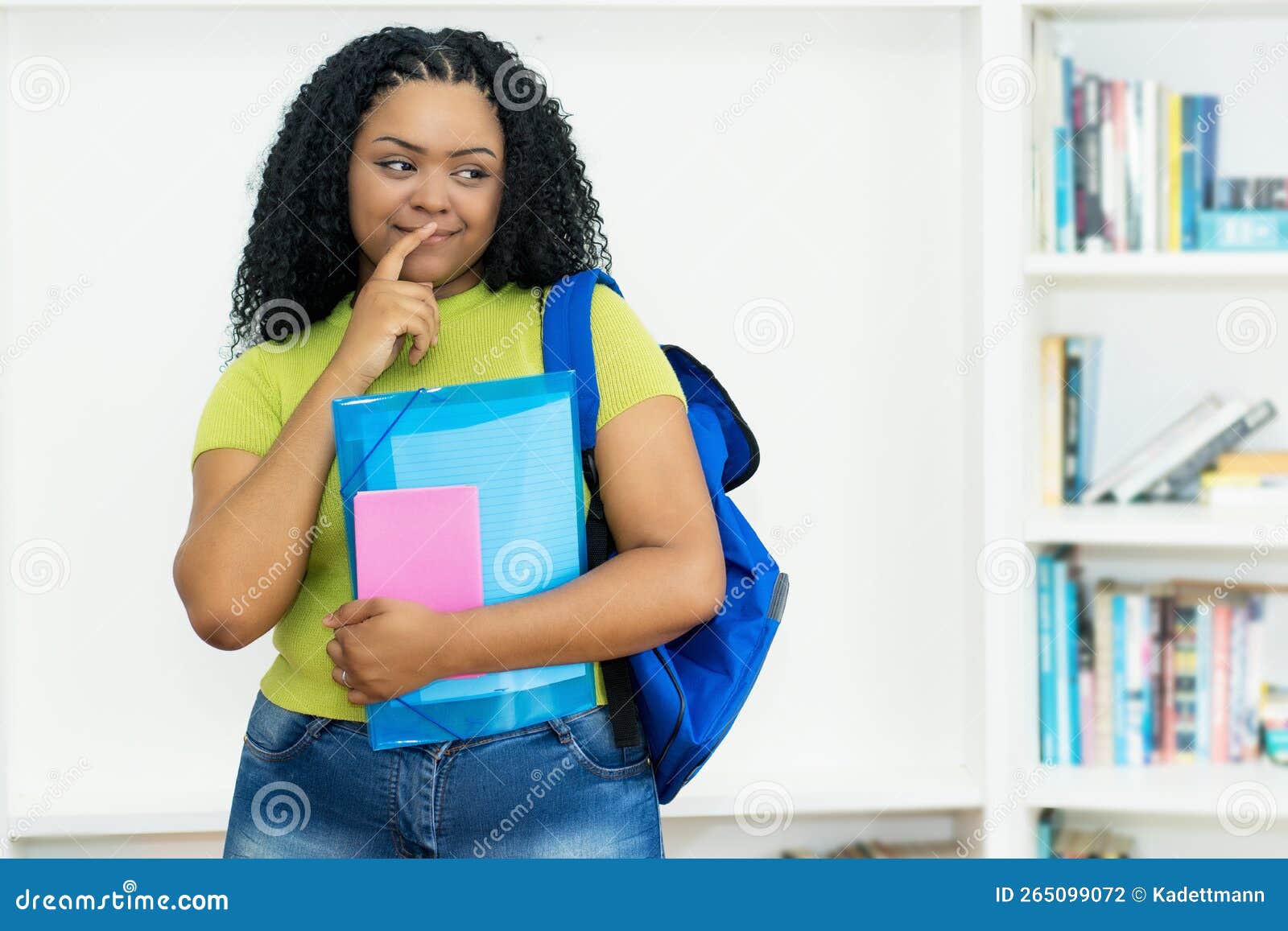 Thinking Black Female Student with Backpack and Paperwork Stock Photo ...