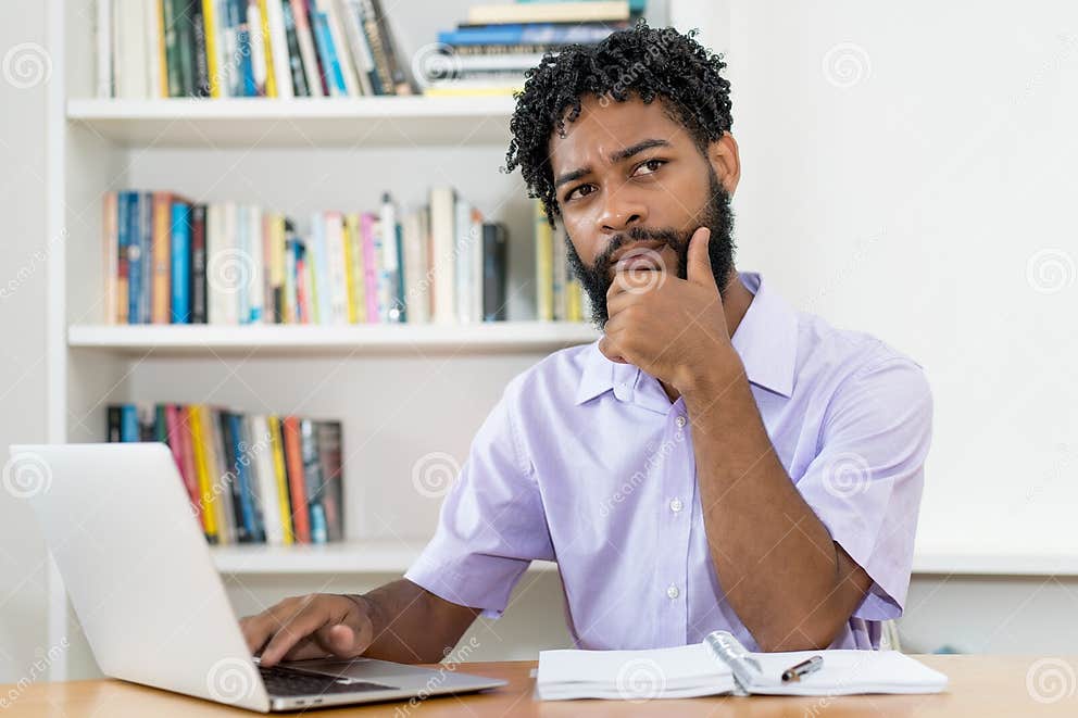 Thinking Black Hipster Software Developer Programming at Computer Stock ...