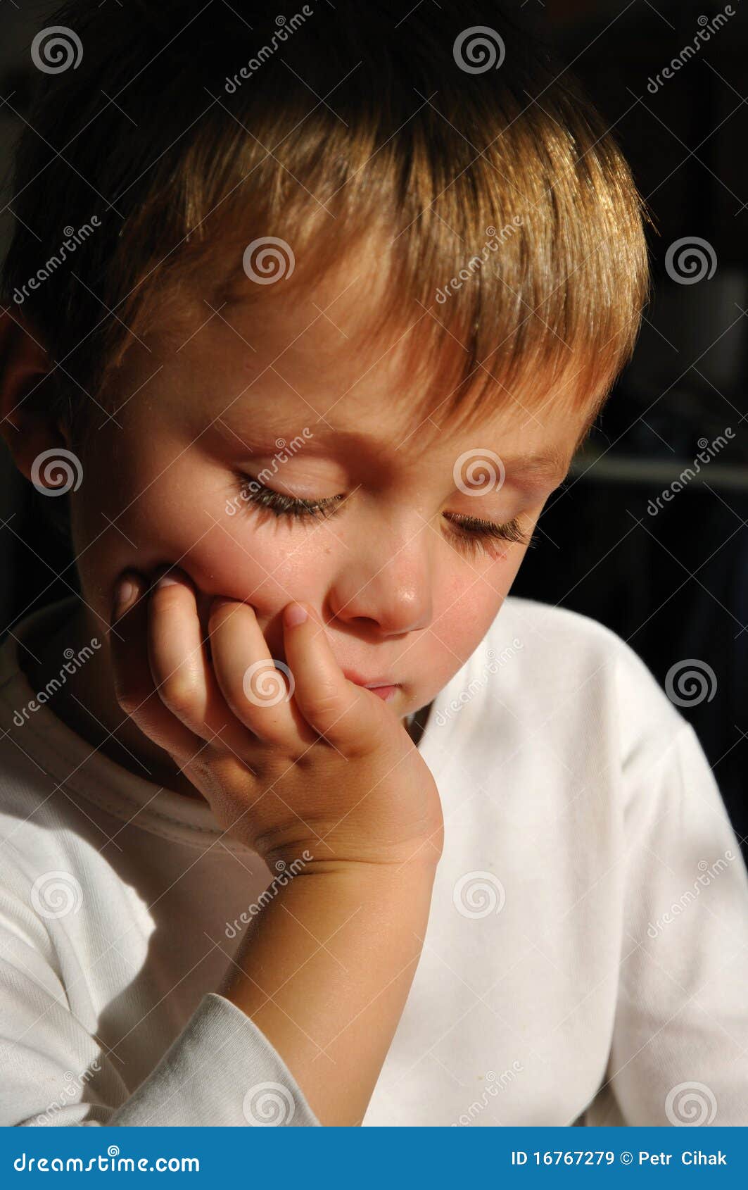 Thinking boy stock image. Image of kids, sitting, pensive - 16767279