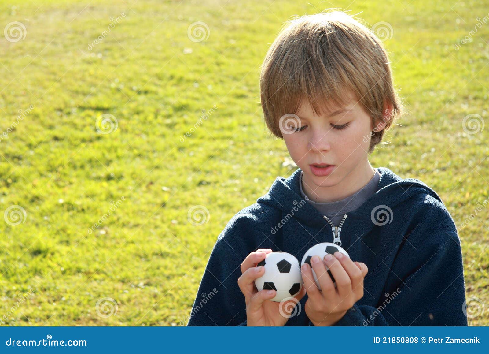 Thinking Boy with Two Balls Stock Photo - Image of ball, child: 21850808