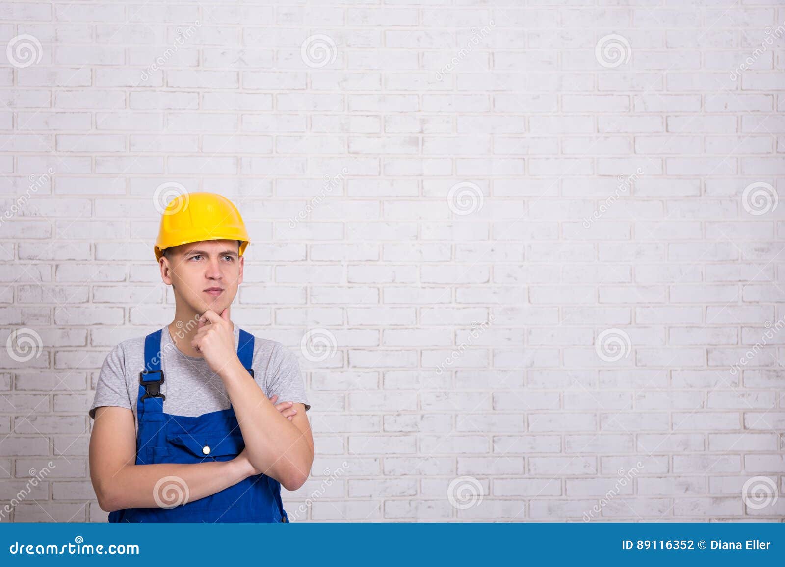 Thinking Builder in Uniform and Copy Space Over White Wall Stock Photo ...