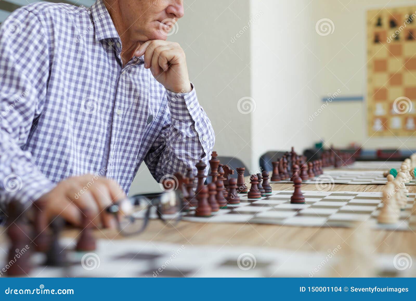 Thinking about chess move stock photo. Image of adult - 150001104