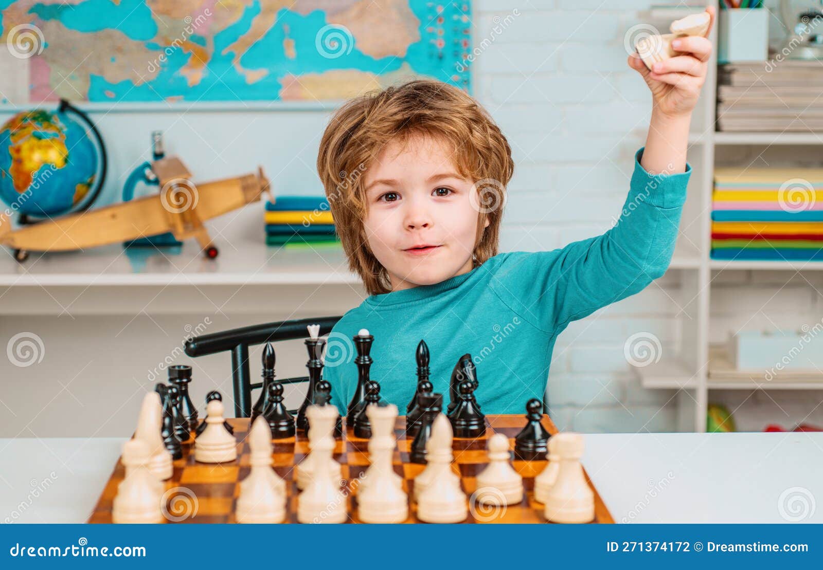 Thinking Child. Little Boy Playing Chess. Concentrated Boy Developing ...