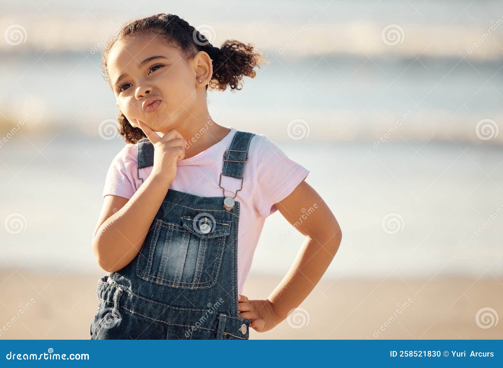 Thinking Child, Planning and in Doubt at Beach Front on Vacation in ...