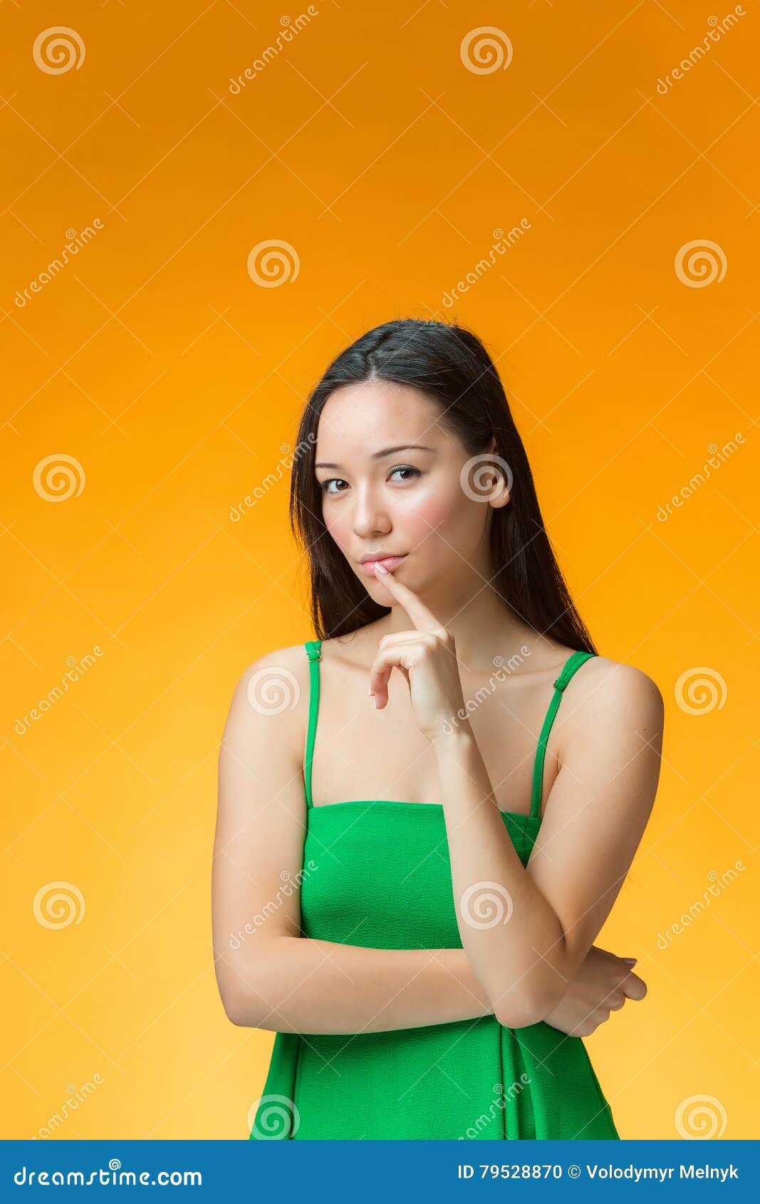 The Thinking Chinese Girl On Yellow Background Royalty-Free Stock ...