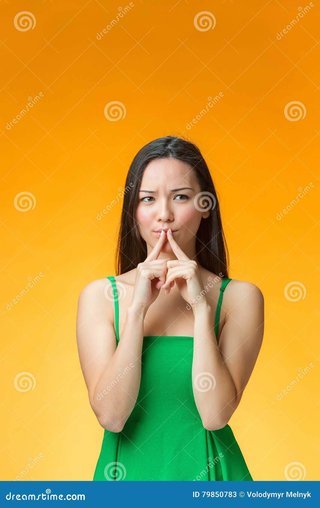 The Thinking Chinese Girl On Yellow Background Royalty-Free Stock ...