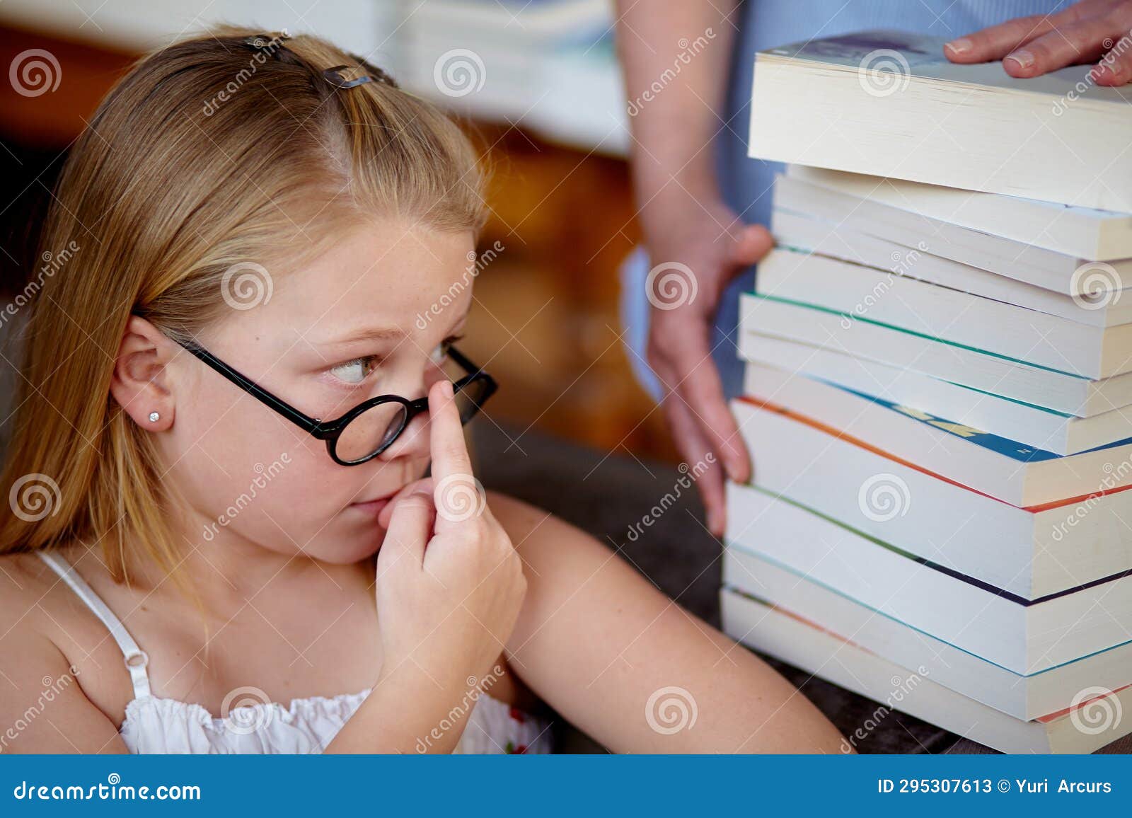 Thinking, Concern and a Child with Books at a Library for Education ...