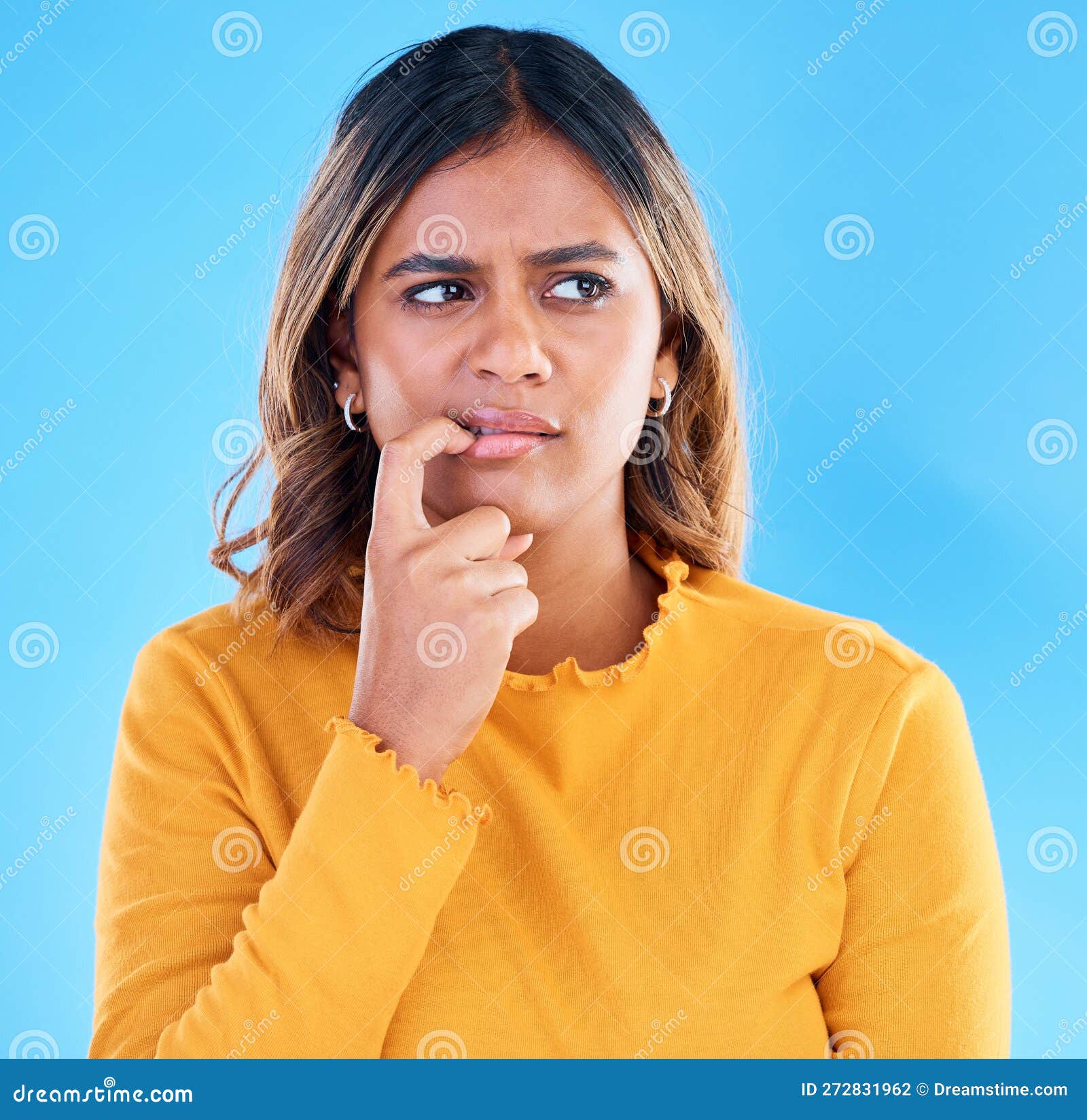 Thinking, Doubt and Worry with a Woman on a Blue Background in Studio ...