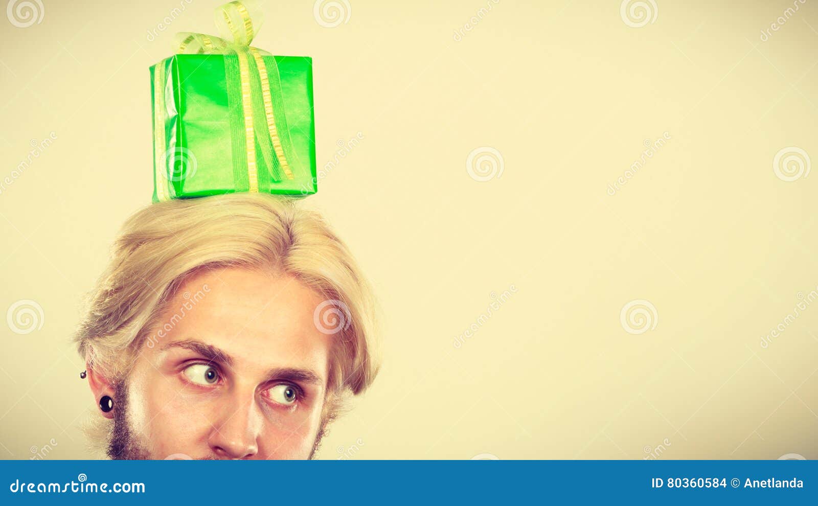 Thinking Guy with Green Gift Box on His Head Stock Photo - Image of ...