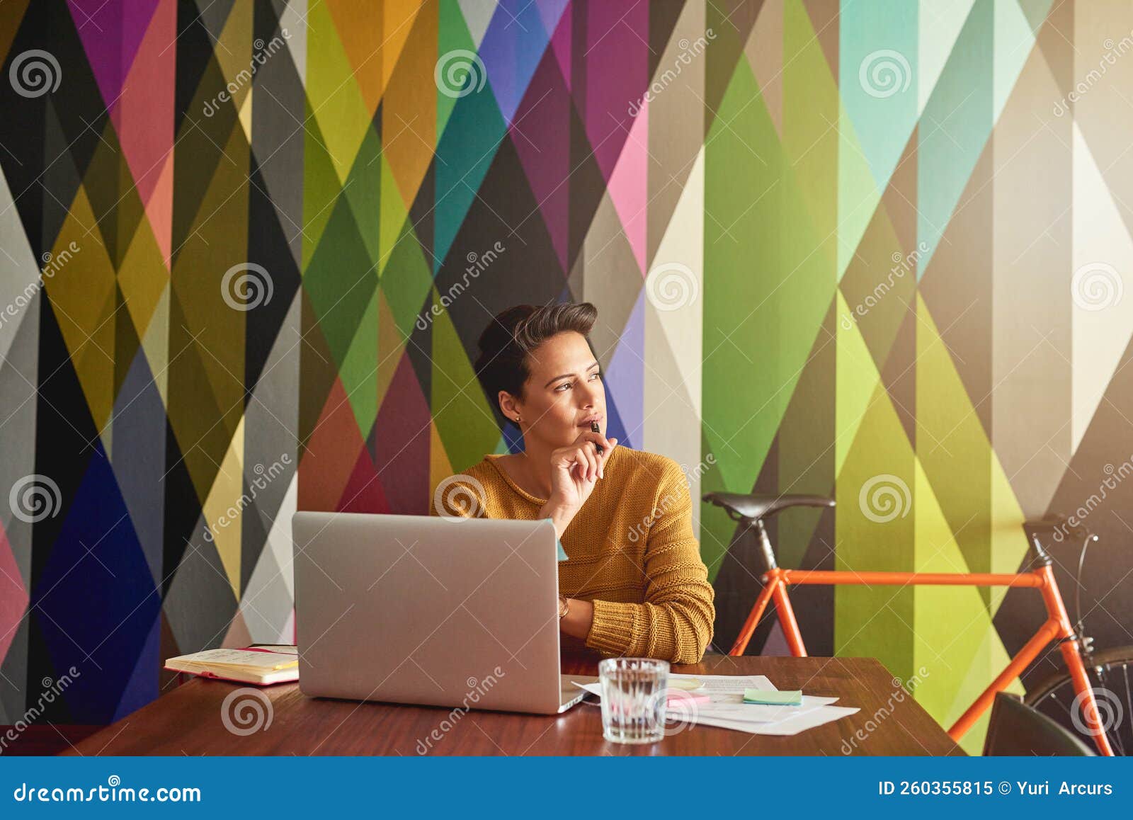 Thinking about Innovative Ideas. a Creative Employee Working in a ...