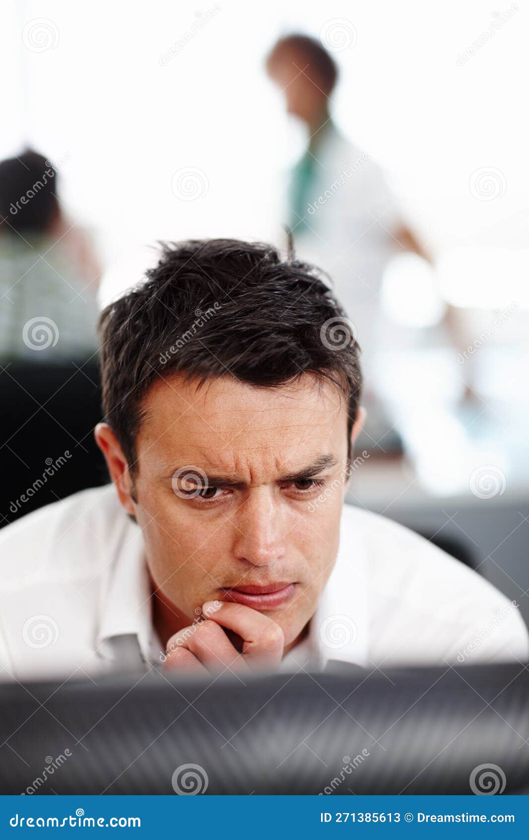 Thinking Long and Hard. a Young Businessman Looking Thoughtful in the ...