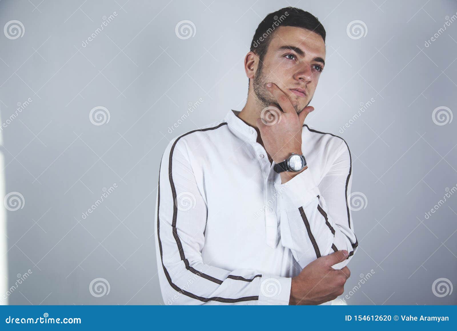 Thinking man hand in face stock photo. Image of adult - 154612620