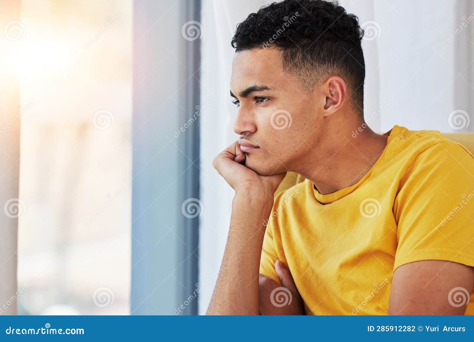 Thinking Man And Home With Stress And Sad In Living Room Feeling Bored