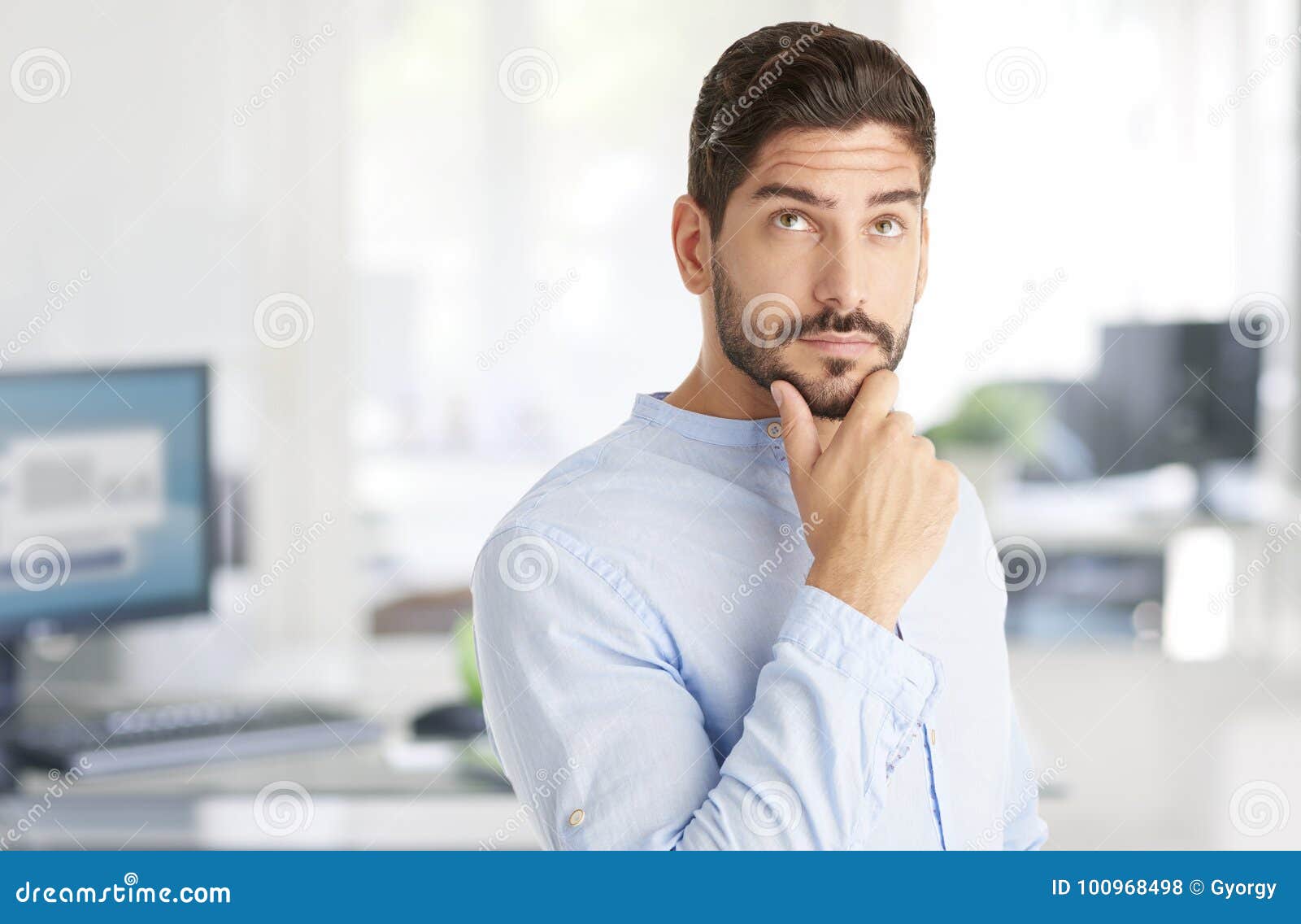 Thinking man at the office stock photo. Image of space - 100968498