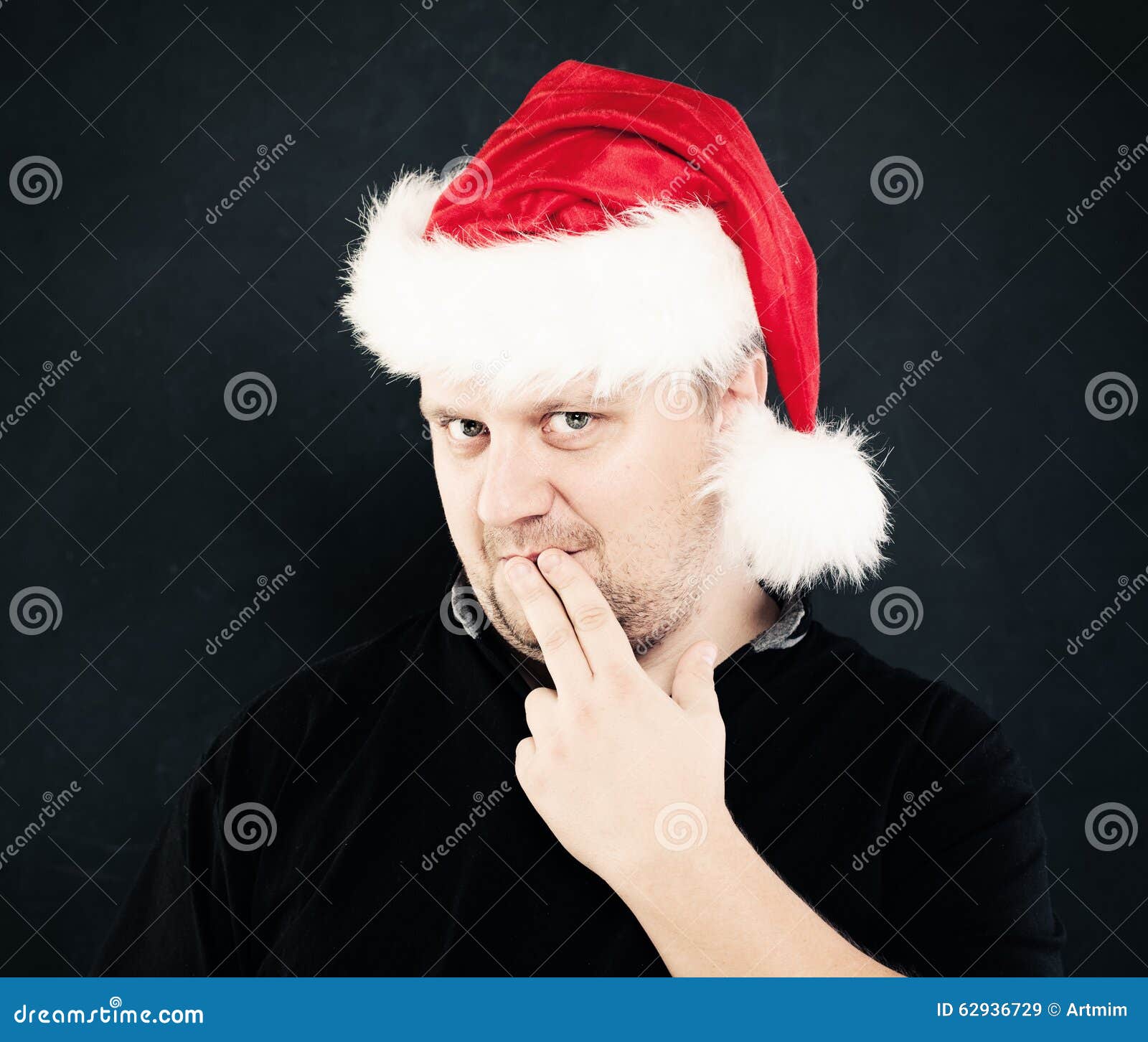Thinking Man in Santa Hat stock image. Image of concept - 62936729