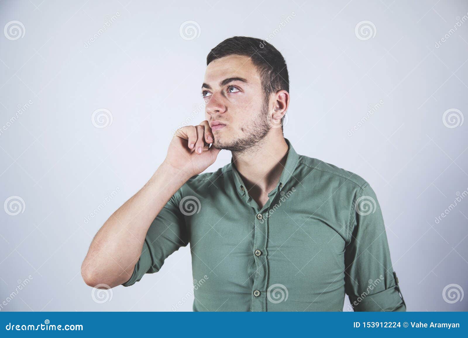 Thinking man in studio stock photo. Image of portrait - 153912224