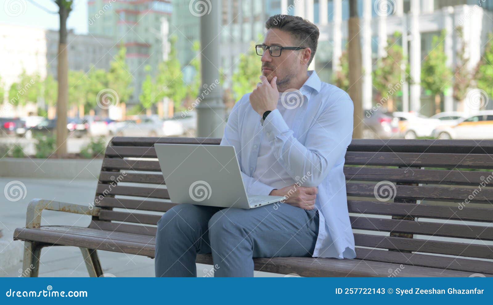 Thinking Man Using Laptop while Sitting Outdoor on Bench Stock Image ...