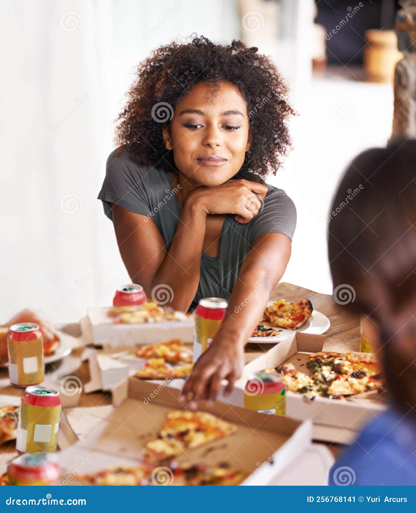 Thinking about the Next Slice. a Group of Friends Enjoying Pizza ...