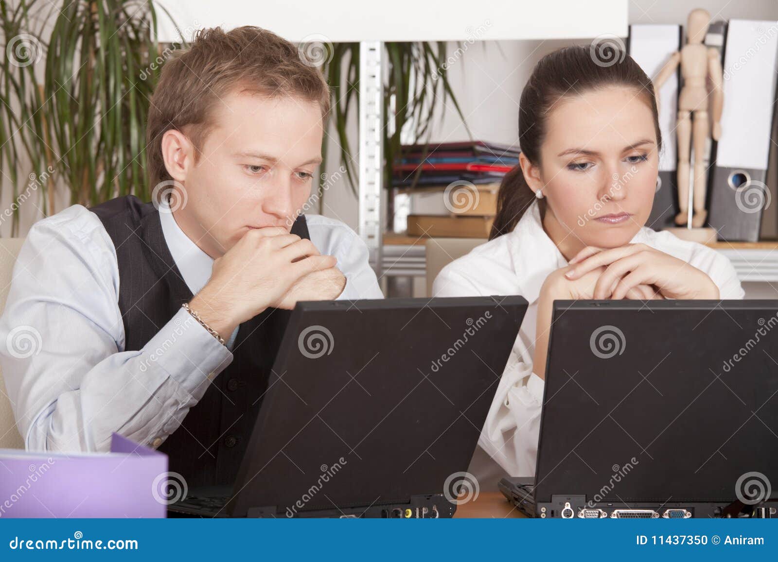Thinking office workers stock photo. Image of adults - 11437350