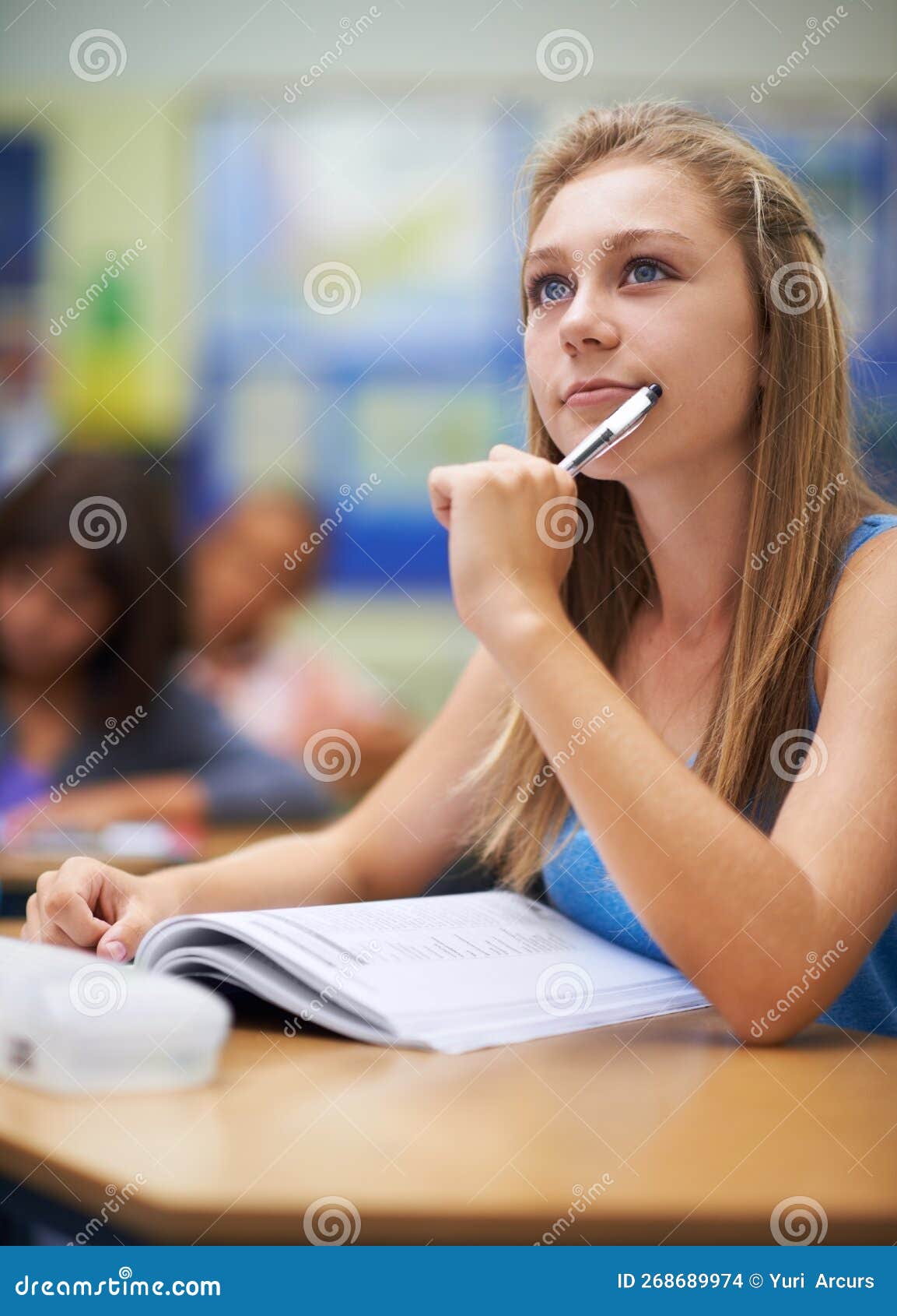 Thinking of the Solution. a Young Girl Working on Her Schoolwork in ...