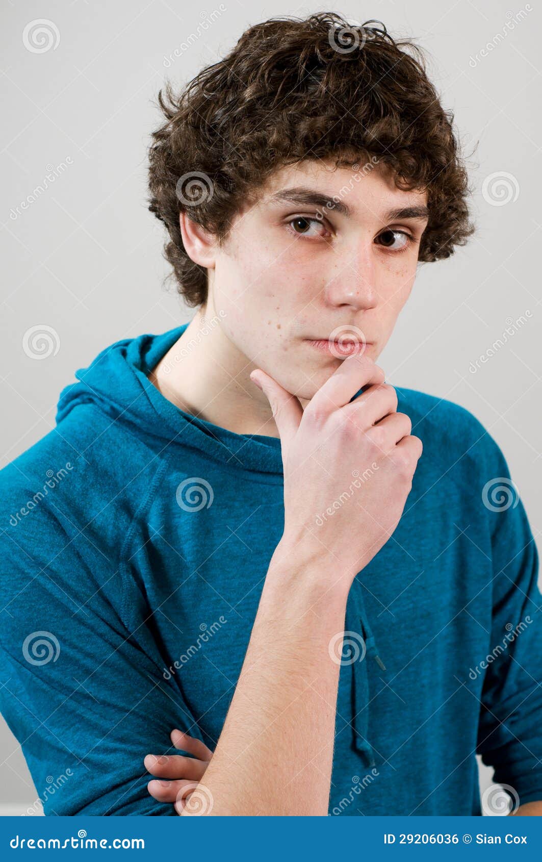 Thinking teen boy stock photo. Image of background, expression - 29206036