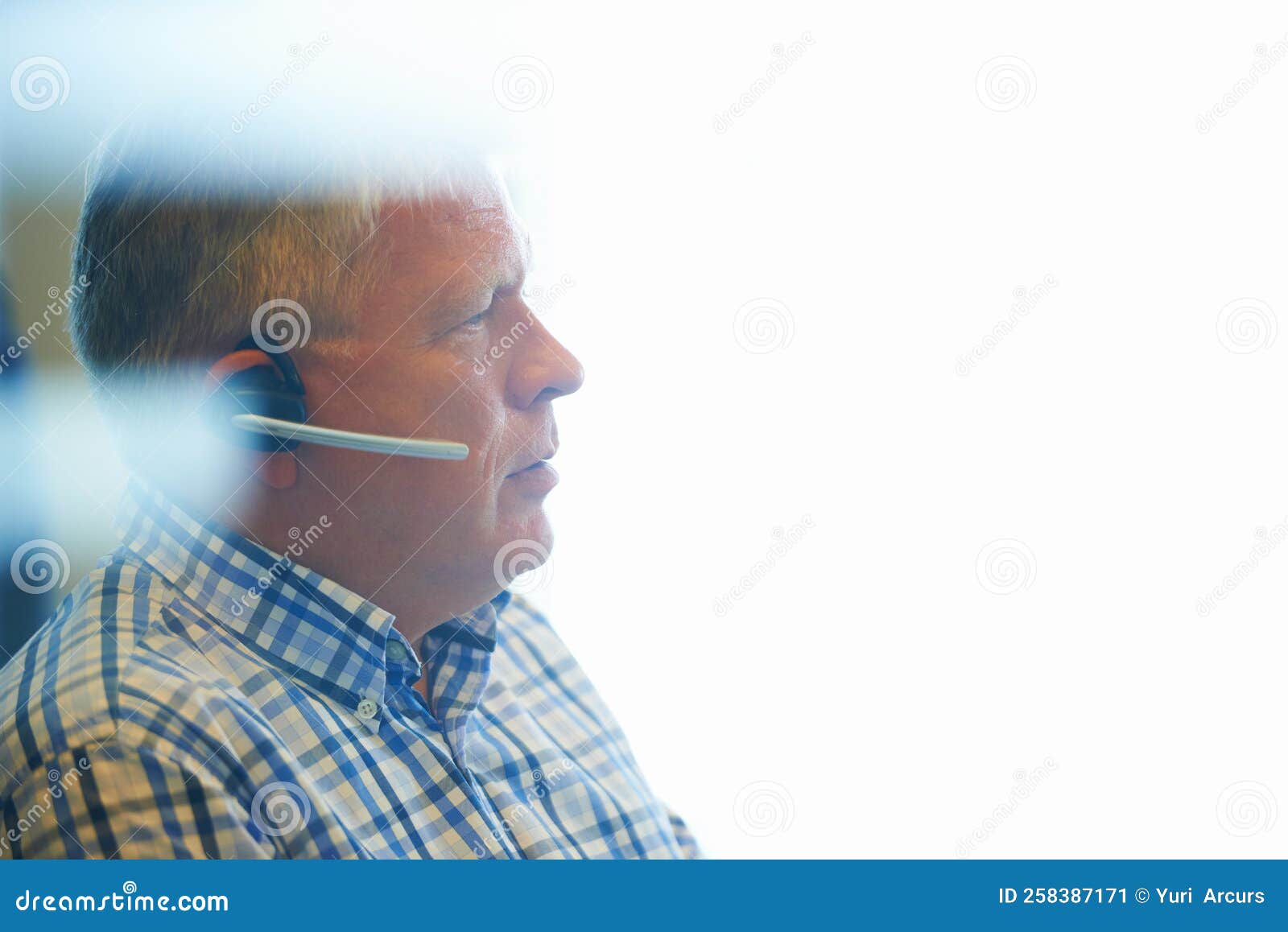 Thinking Things through. a Senior Businessman Wearing a Headset Looking ...