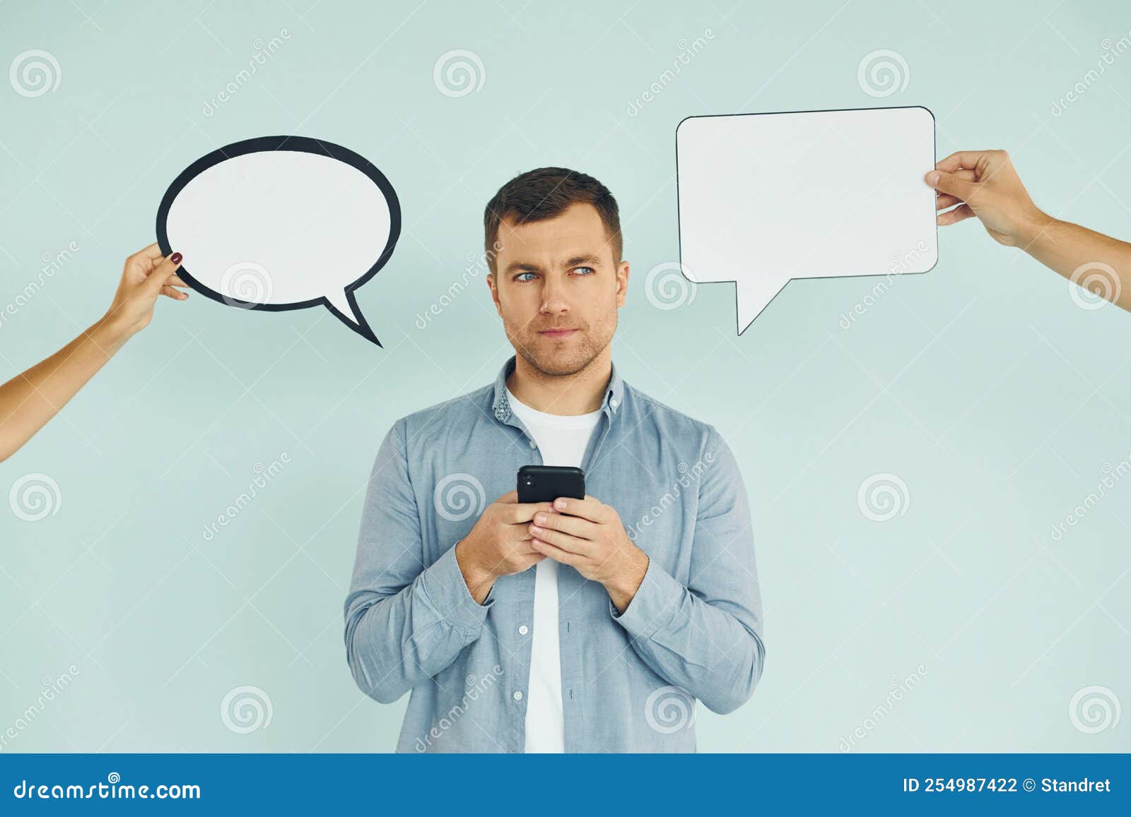 Thinking What To Answer. Man Standing in the Studio with Empty Signs ...