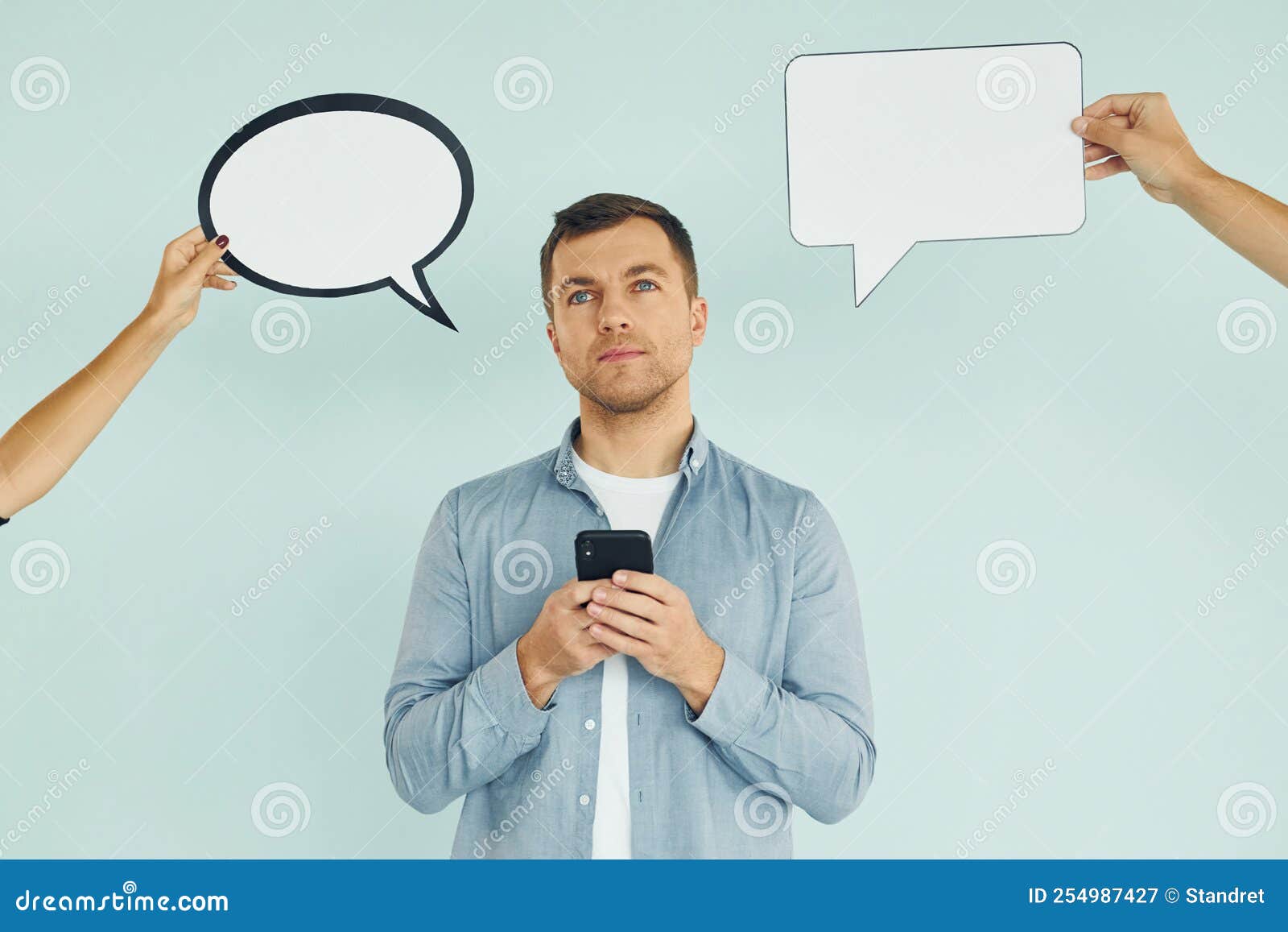 Thinking What To Answer. Man Standing in the Studio with Empty Signs ...