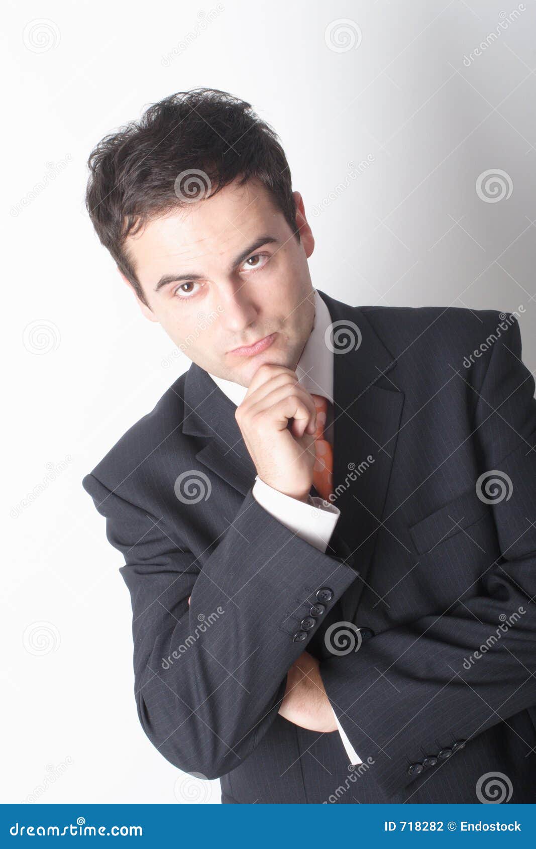 Thinking White Business Man in Suit with Hand on Chin Stock Photo ...