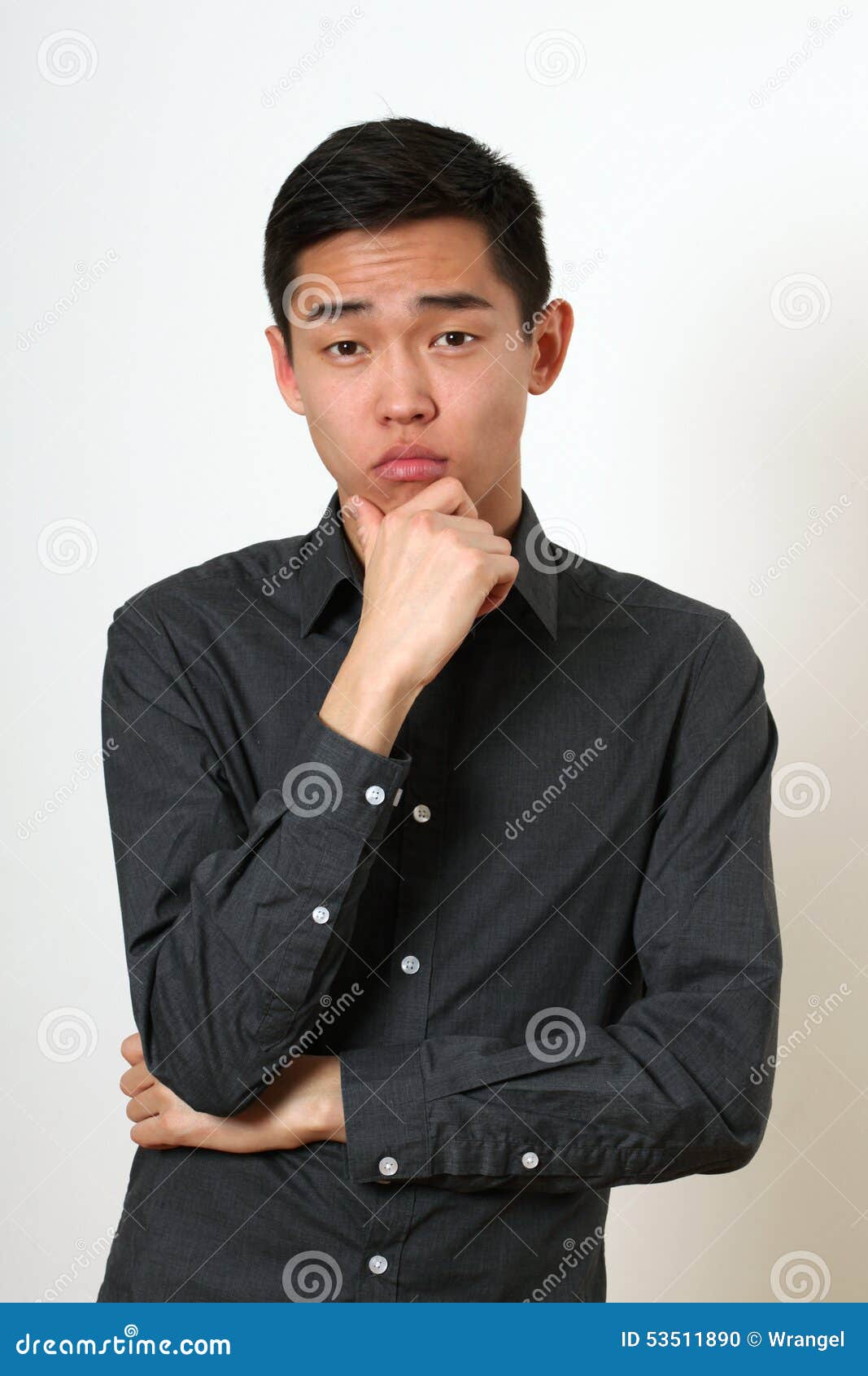 Thinking Young Asian Man Looking at Camera Stock Photo - Image of ...